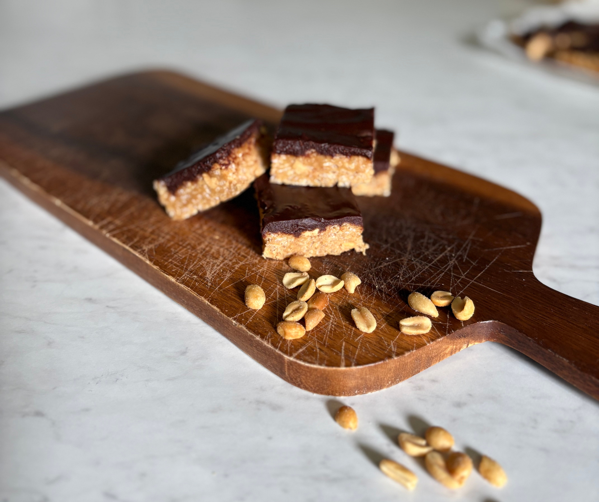 Peanut Butter Rice Krispie Treats with Salted Peanuts and Chocolate ...